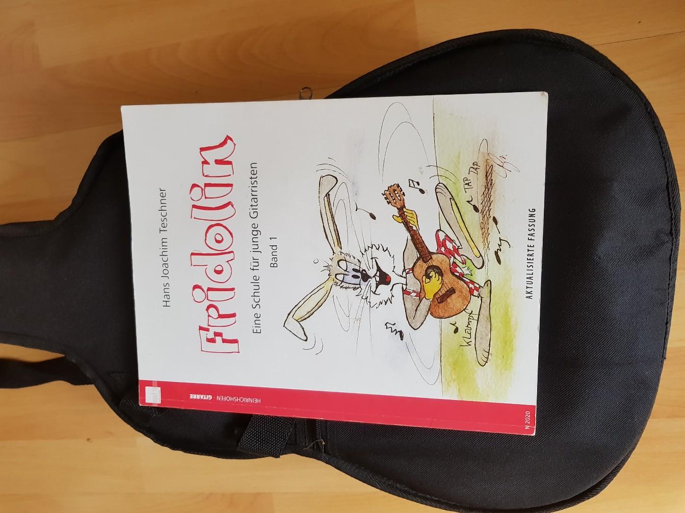 Golden Ton Gitarre mit Lehrbuch in 90441 Nürnberg für 29,00 € zum ...