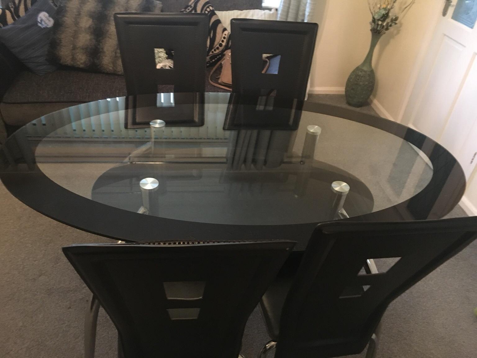 Large glass dining table and chairs in NG11 Clifton for £55.00 for sale ...