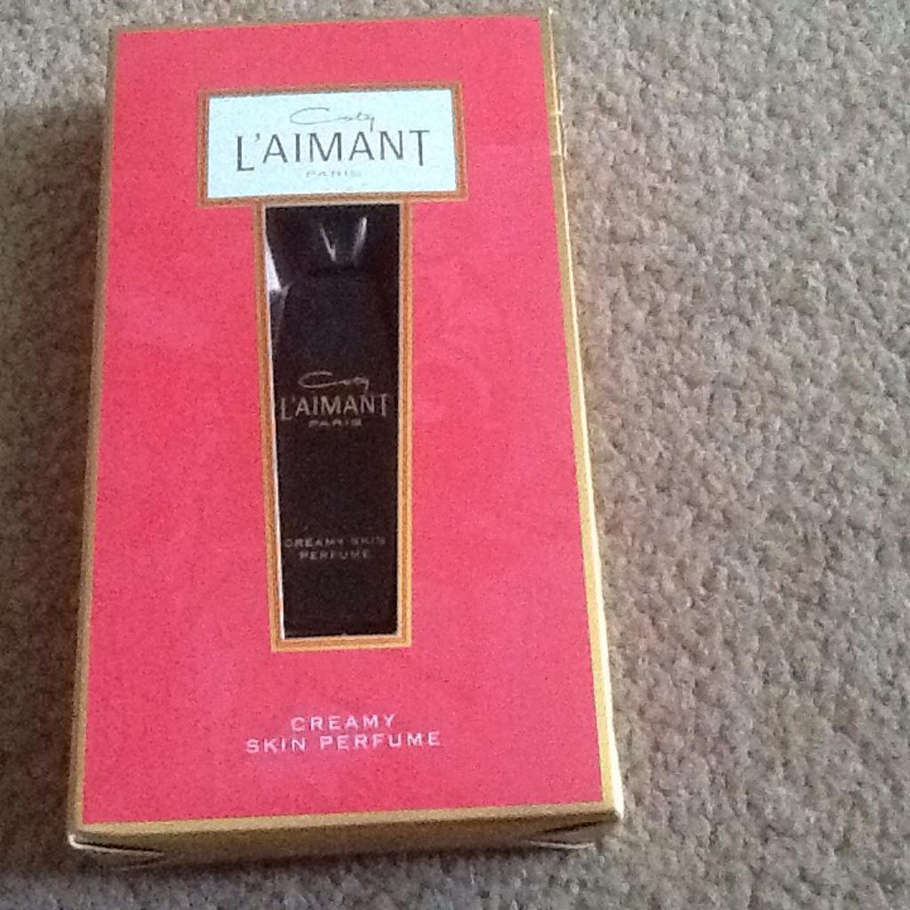 PERFUME Coty L'AIMANT creamy skin perfume. in Staffordshire Moorlands ...