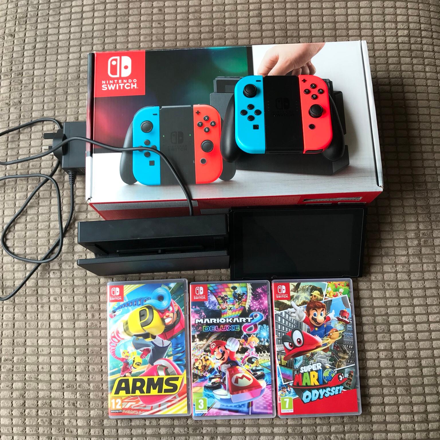 Nintendo switch with three games in EC1Y London für £ 300,00 zum ...