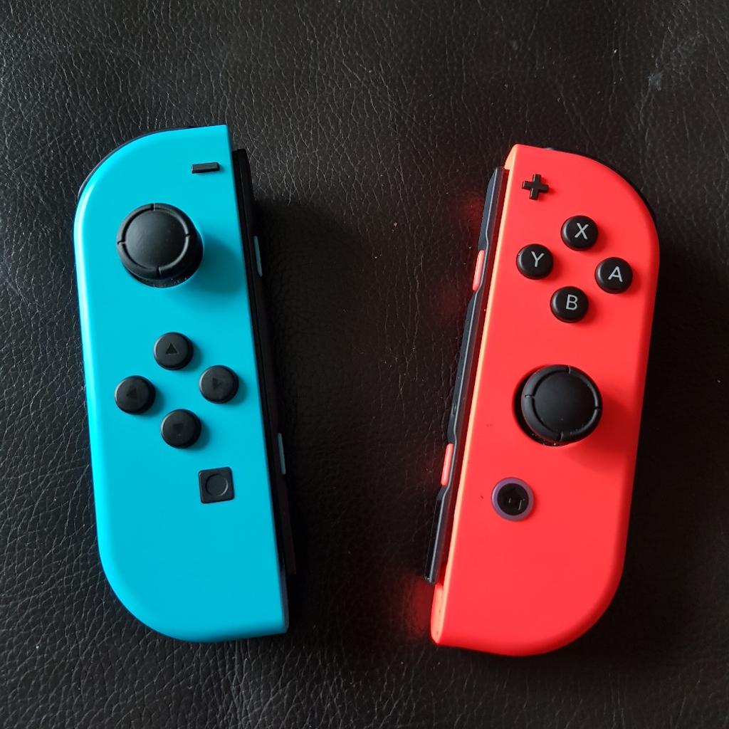 Nintendo Switch Joycons (Neon Red/Blue) in IP33 Edmundsbury für £ 50,00 ...