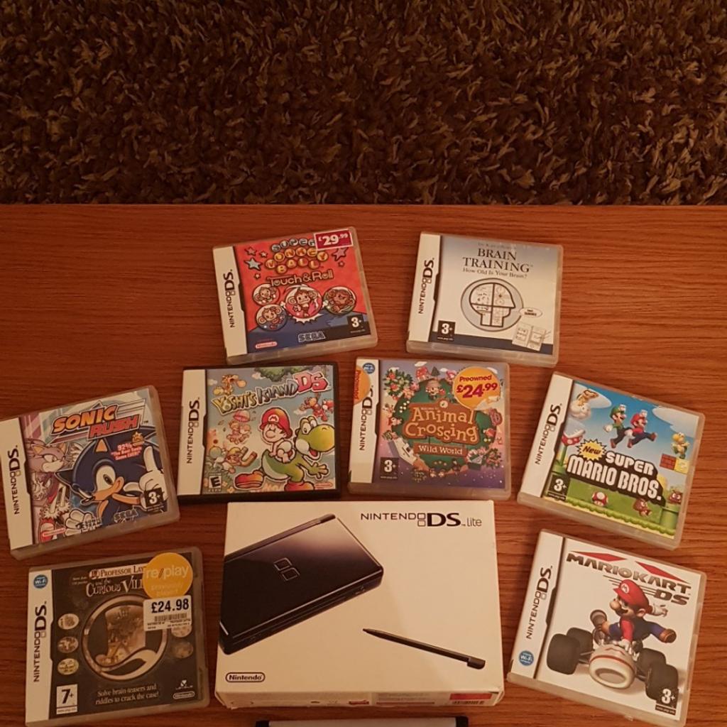 Boxed Black Nintendo ds lite with 8 games in SS16 Basildon für 20,00 ...