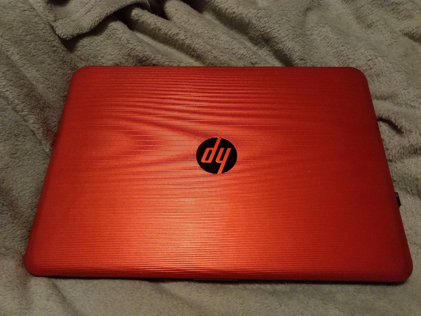 Red HP laptop with wireless Logitech mouse in Coventry for £200.00 for ...