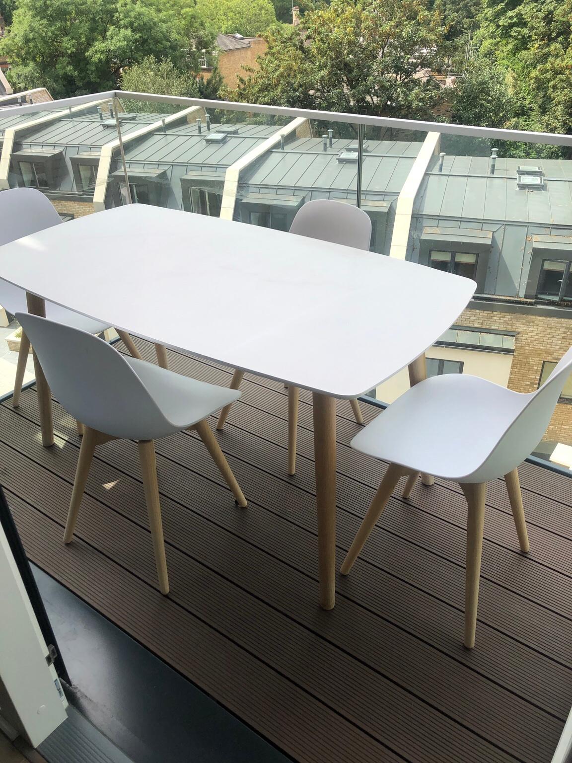 Dining Table 4 Chairs White with Wood Frame in SW6 Fulham for £200.00 ...