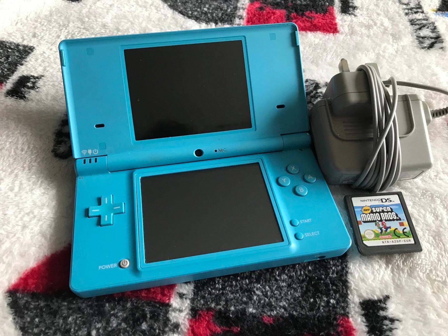 Blue Nintendo DSi with super Mario bros game in WN8 Lancashire für 35 ...